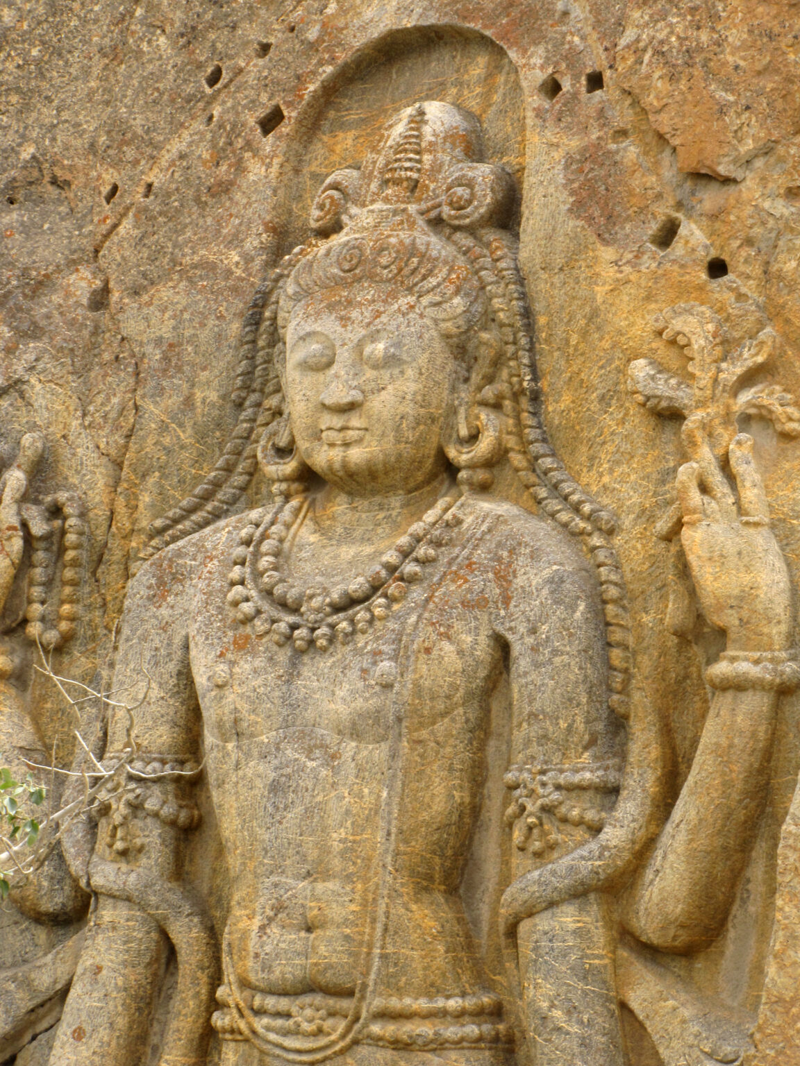 Rock Carving of Four-Armed Bodhisattva Maitreya | Project Himalayan Art
