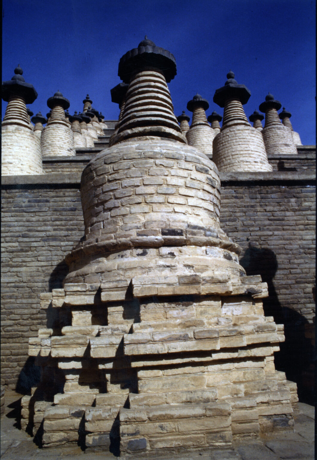 One Hundred and Eight Stupas arranged in a triangular shape on the hill ...